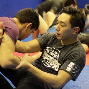How to Arm Drag From Half Guard – BJJ Fanatics